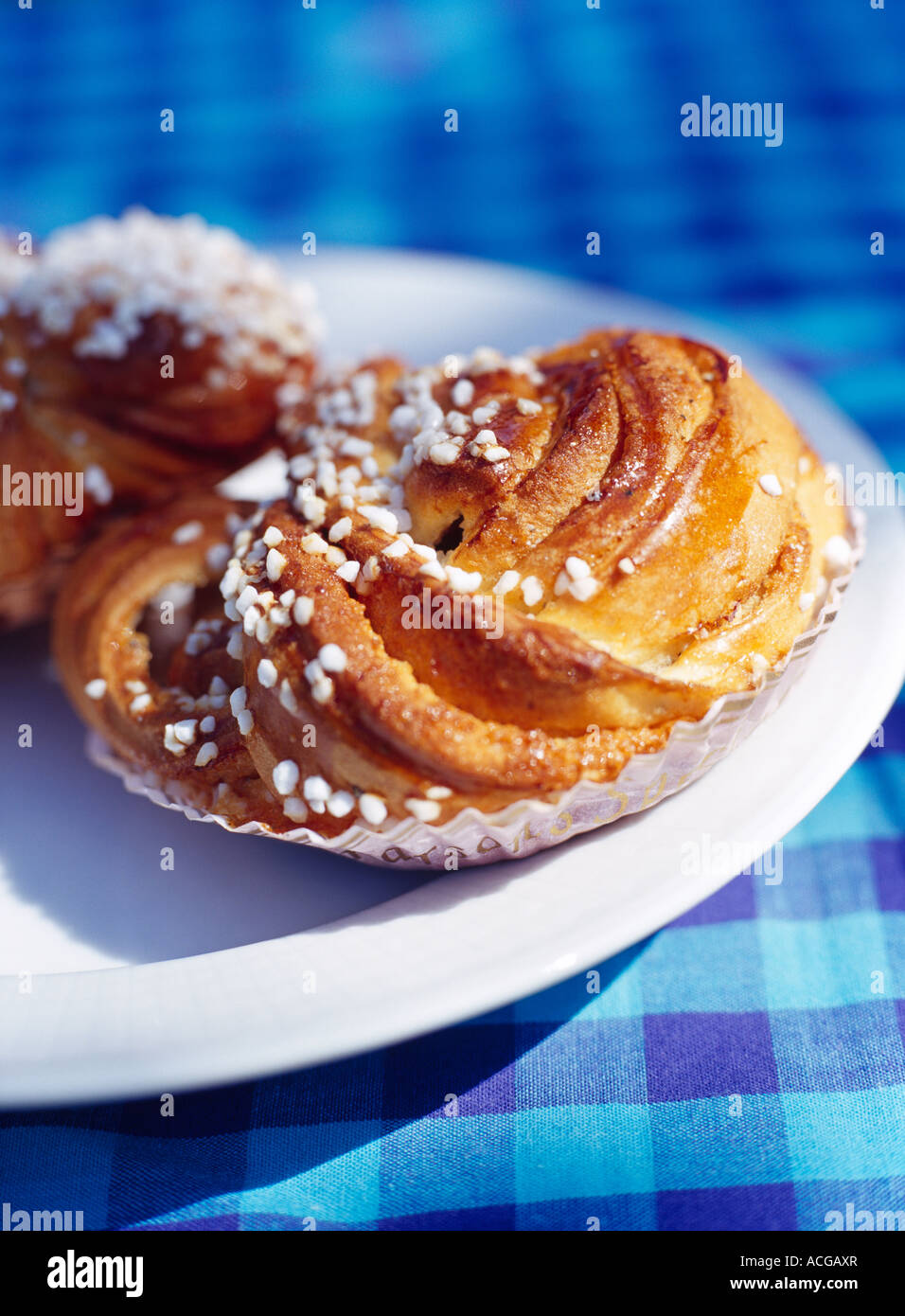 Buns on a plate close-up Stock Photo - Alamy