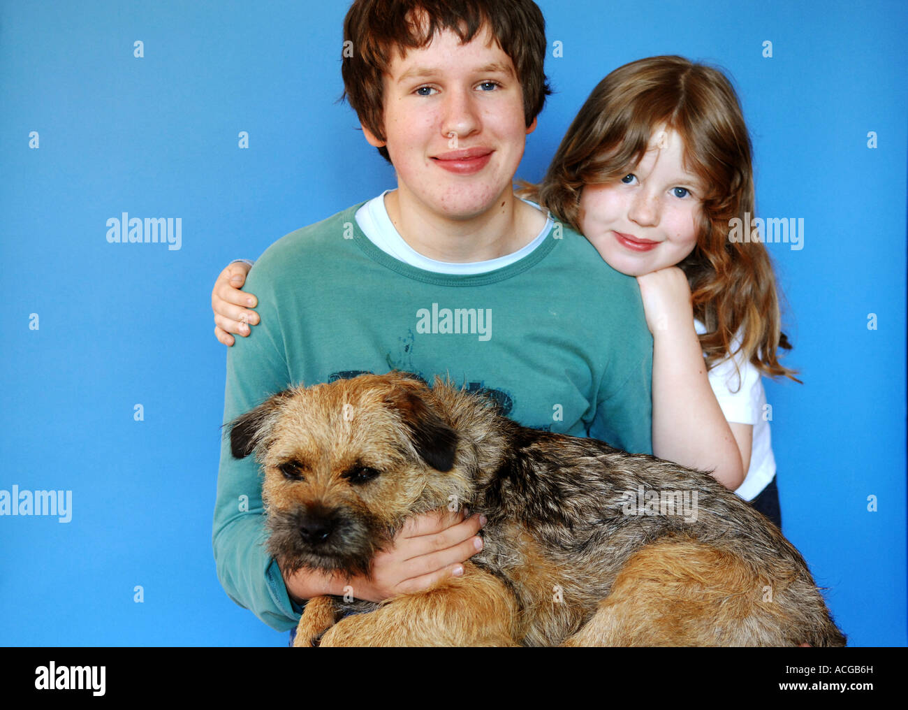 Kids With Pet Dog Stock Photo - Alamy