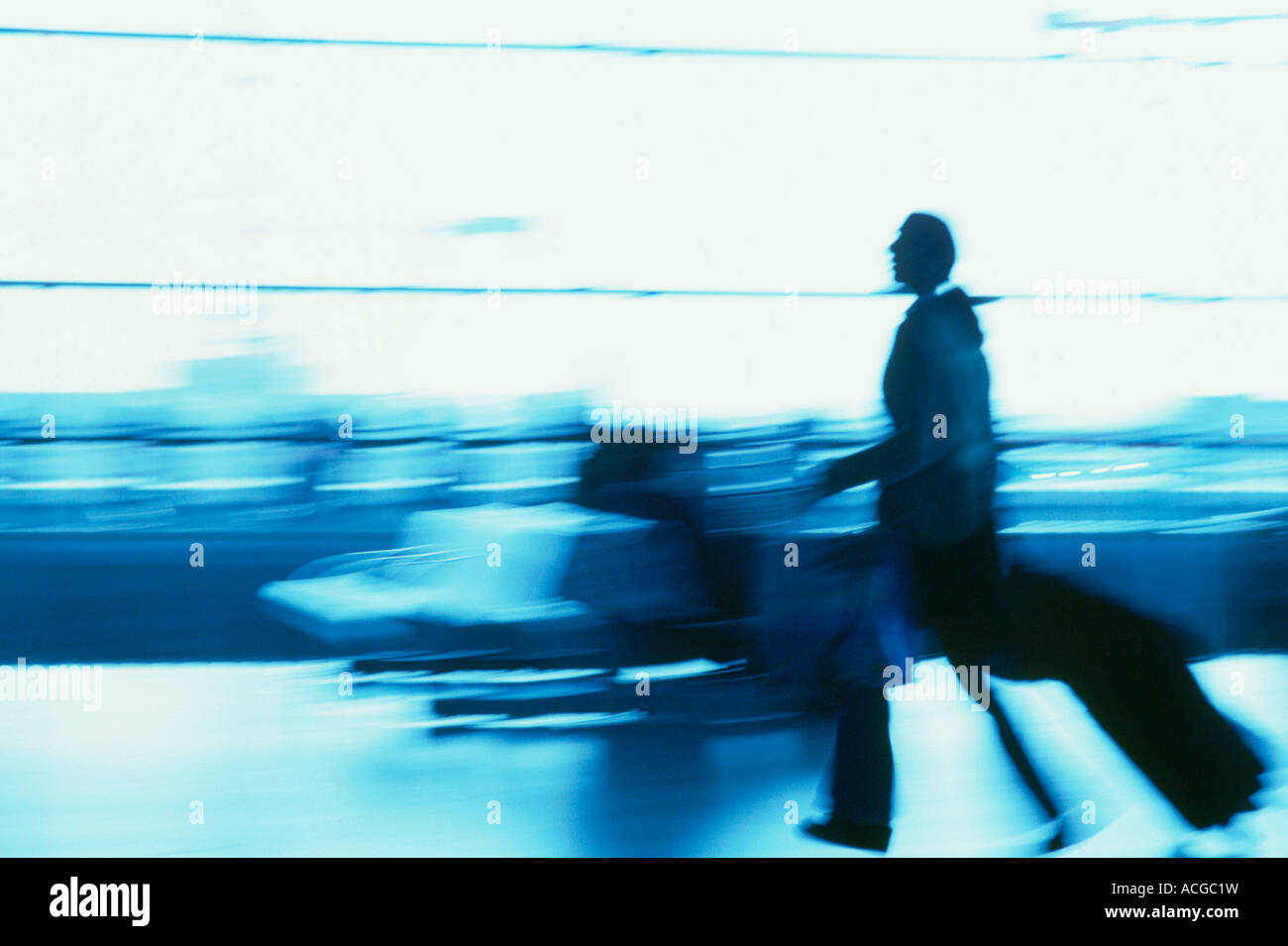 Roissy airport silhouette woman with suitcase Stock Photo - Alamy
