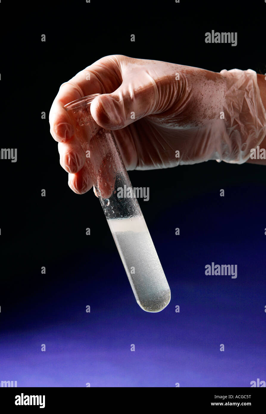 Test tube in hand Stock Photo - Alamy