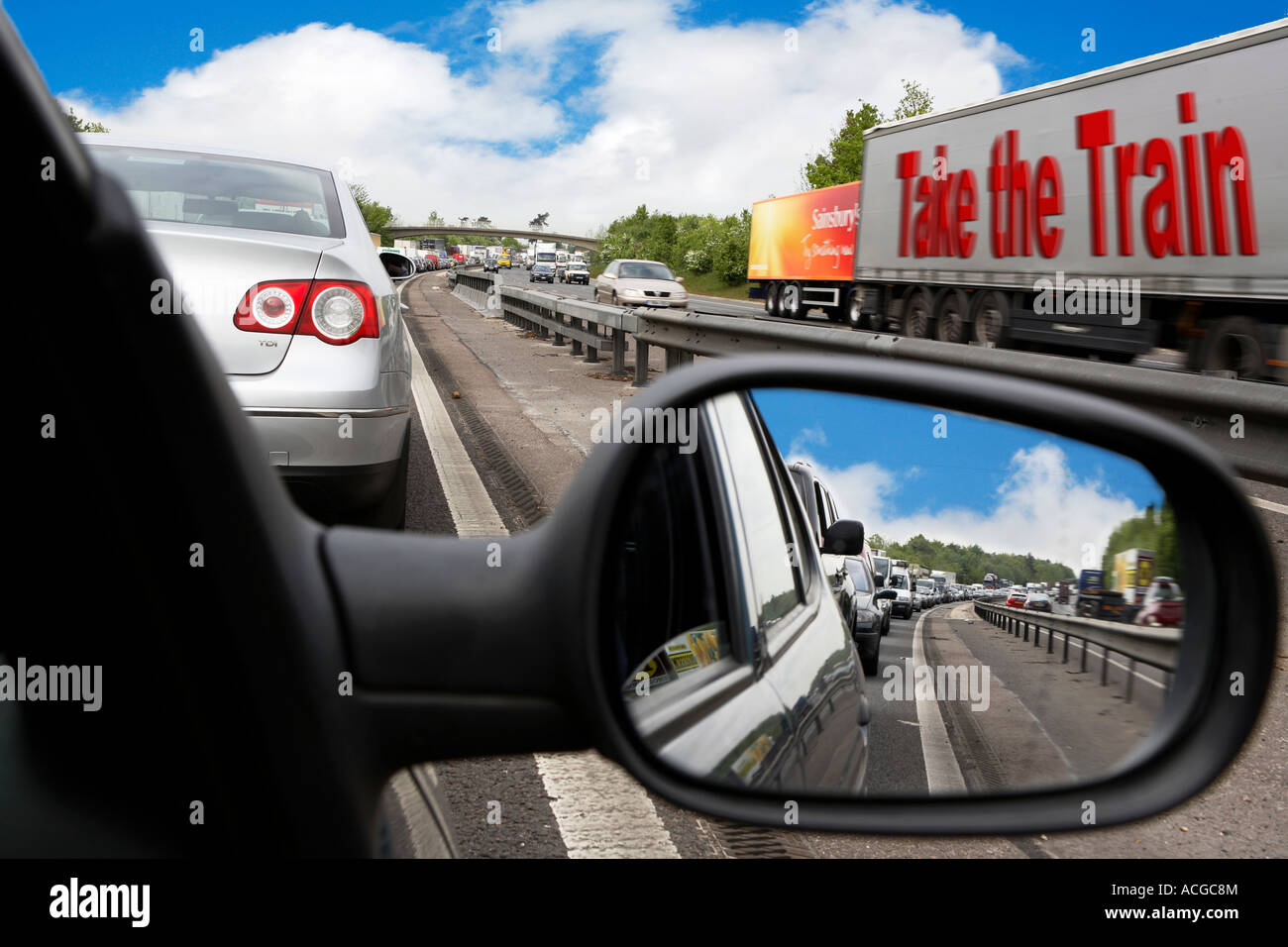 Traffic jam on M1, Take the train Stock Photo - Alamy