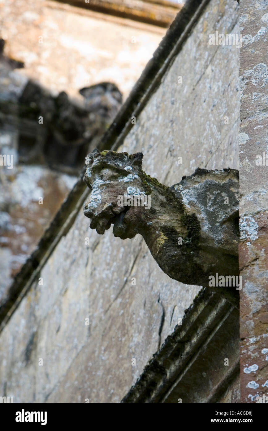 Weathered carved stone Gargoyles on an English church. Oxfordshire ...