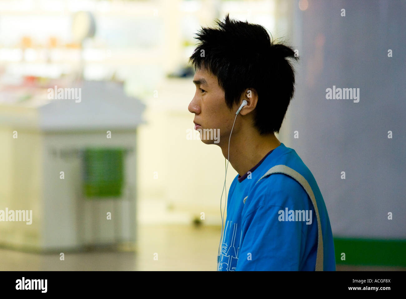 Young Korean Man Listening to an MP3 Player Seoul South Korea Stock ...