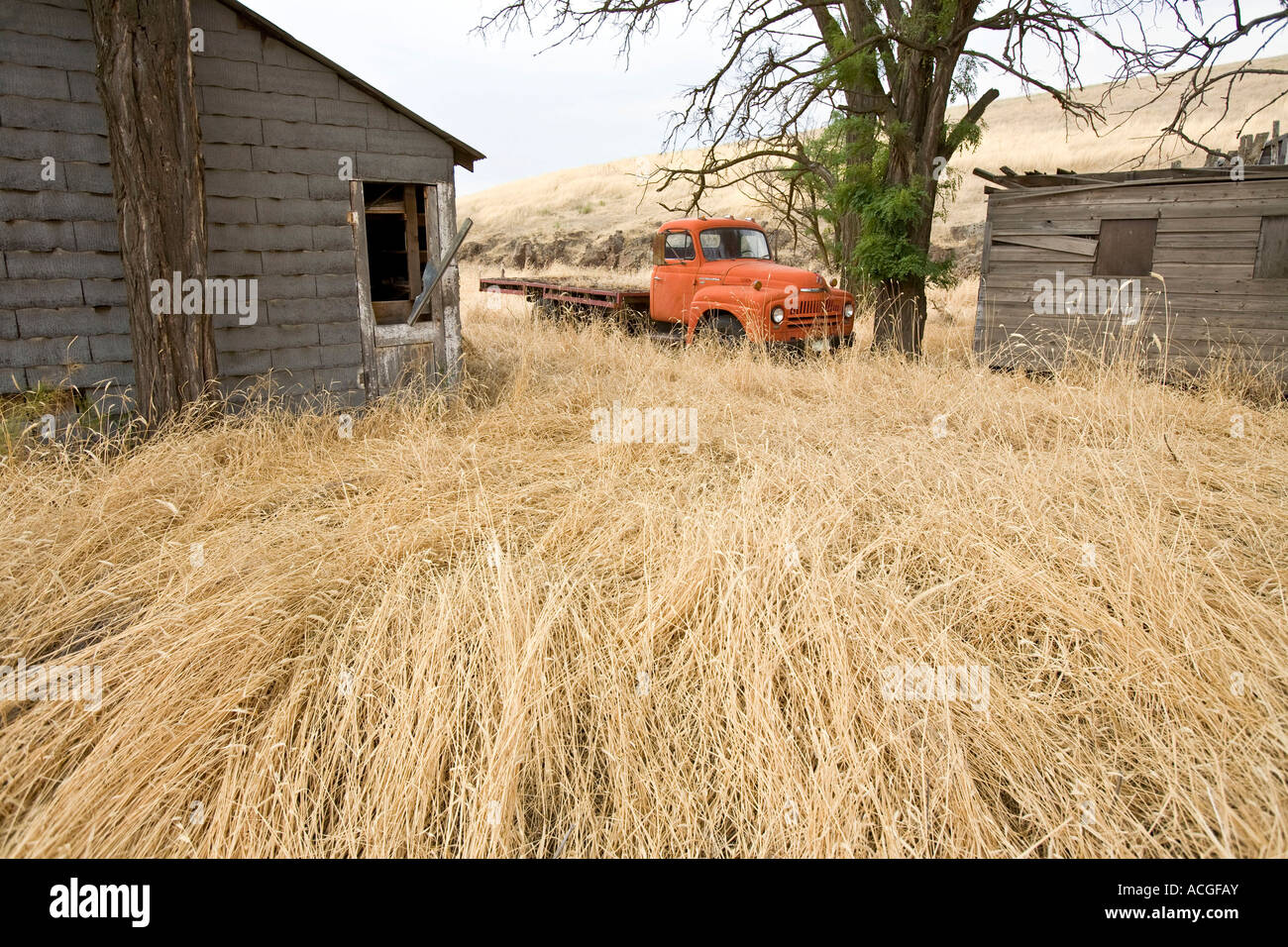 Abandoned farm buildings and truck in the Palouse region, in ...