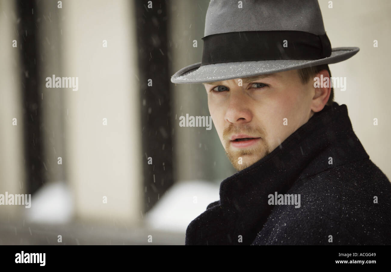 Man overcoat hat hi-res stock photography and images - Alamy