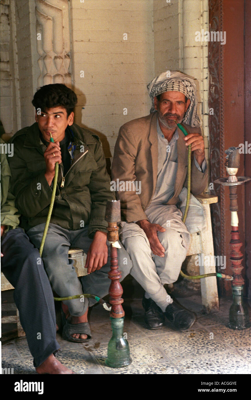 Young Saudi Arabian Man Smoking Arabic Hubble Bubble Hookah, 60% OFF
