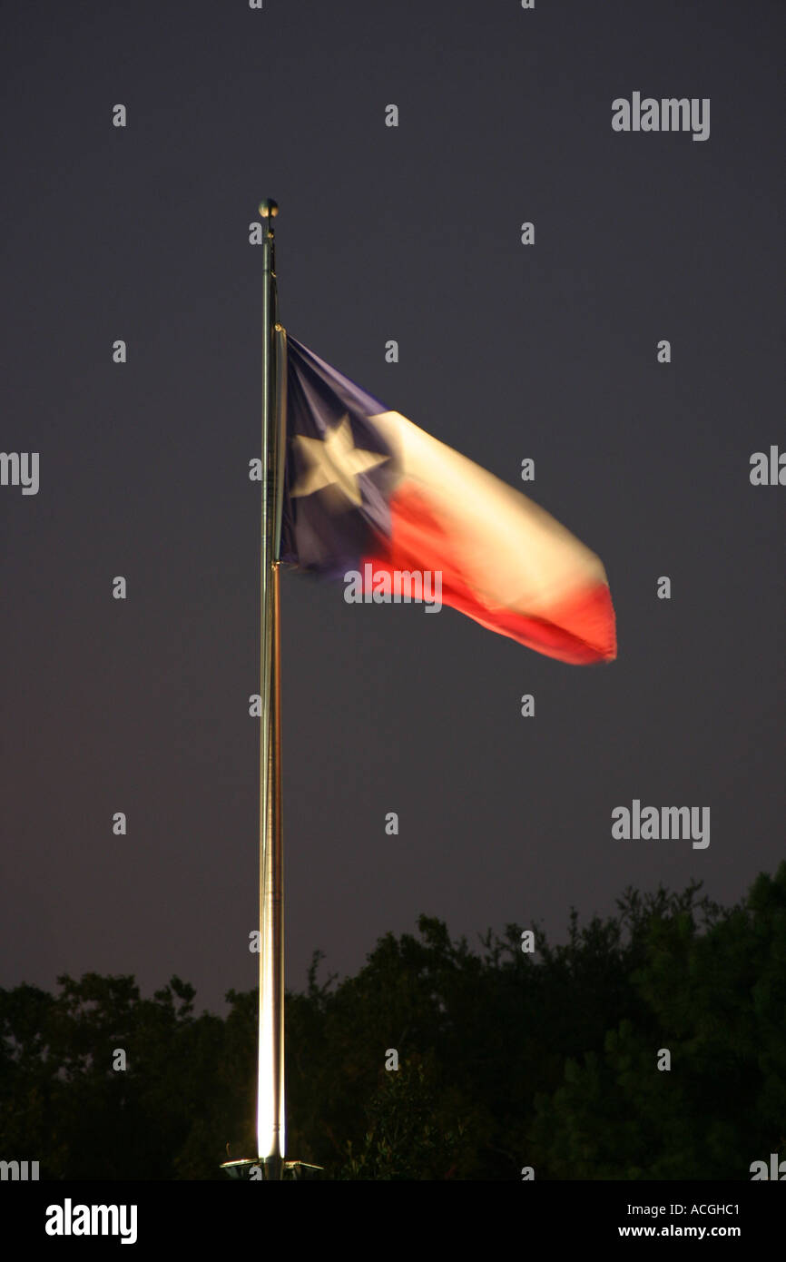 Texas flag illuminated at night Stock Photo - Alamy