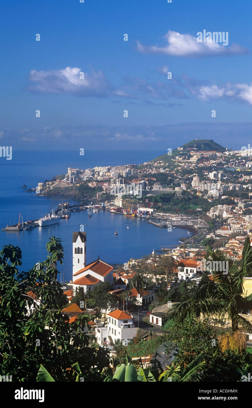 Funchal Harbour overview with cruise ship,church spire and hotel zone ...