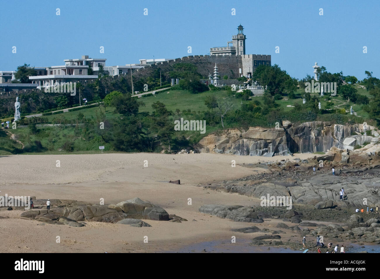People Enjoying the Beach and Ocean Water Outside the Ancient Walled ...