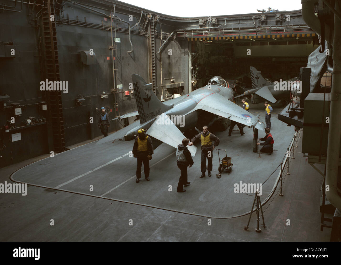 Sea Harrier in hanger of HMS Ark Royal Hanger view Stock Photo - Alamy