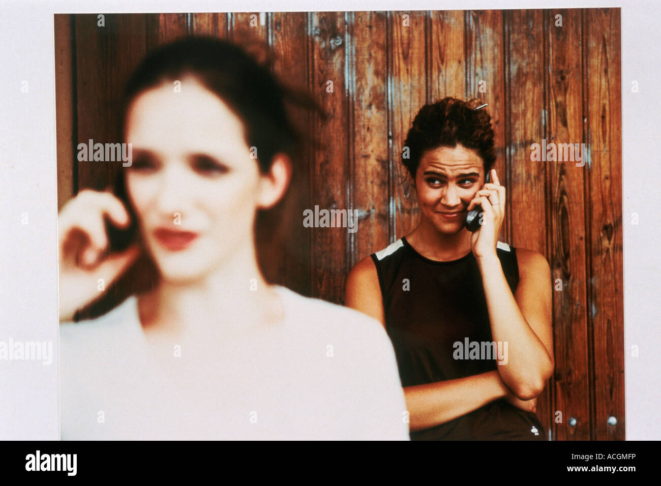 Portrait girls phoning Stock Photo - Alamy