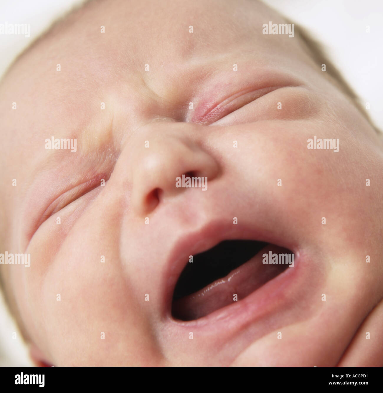 A crying baby Stock Photo - Alamy