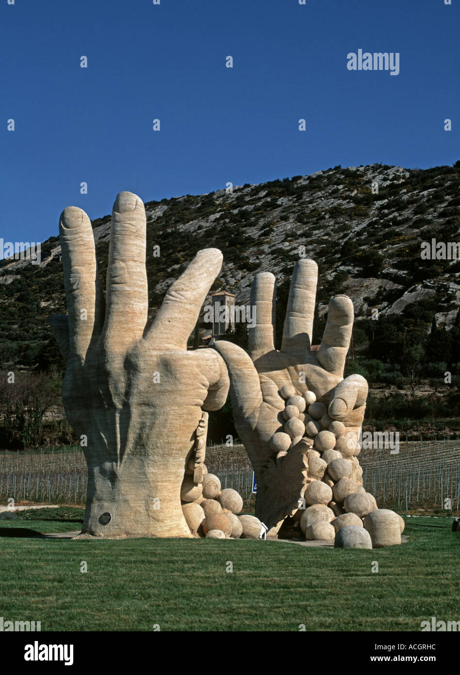 Giant hand sculpture with grapes at Beaumes de Venise Stock Photo - Alamy