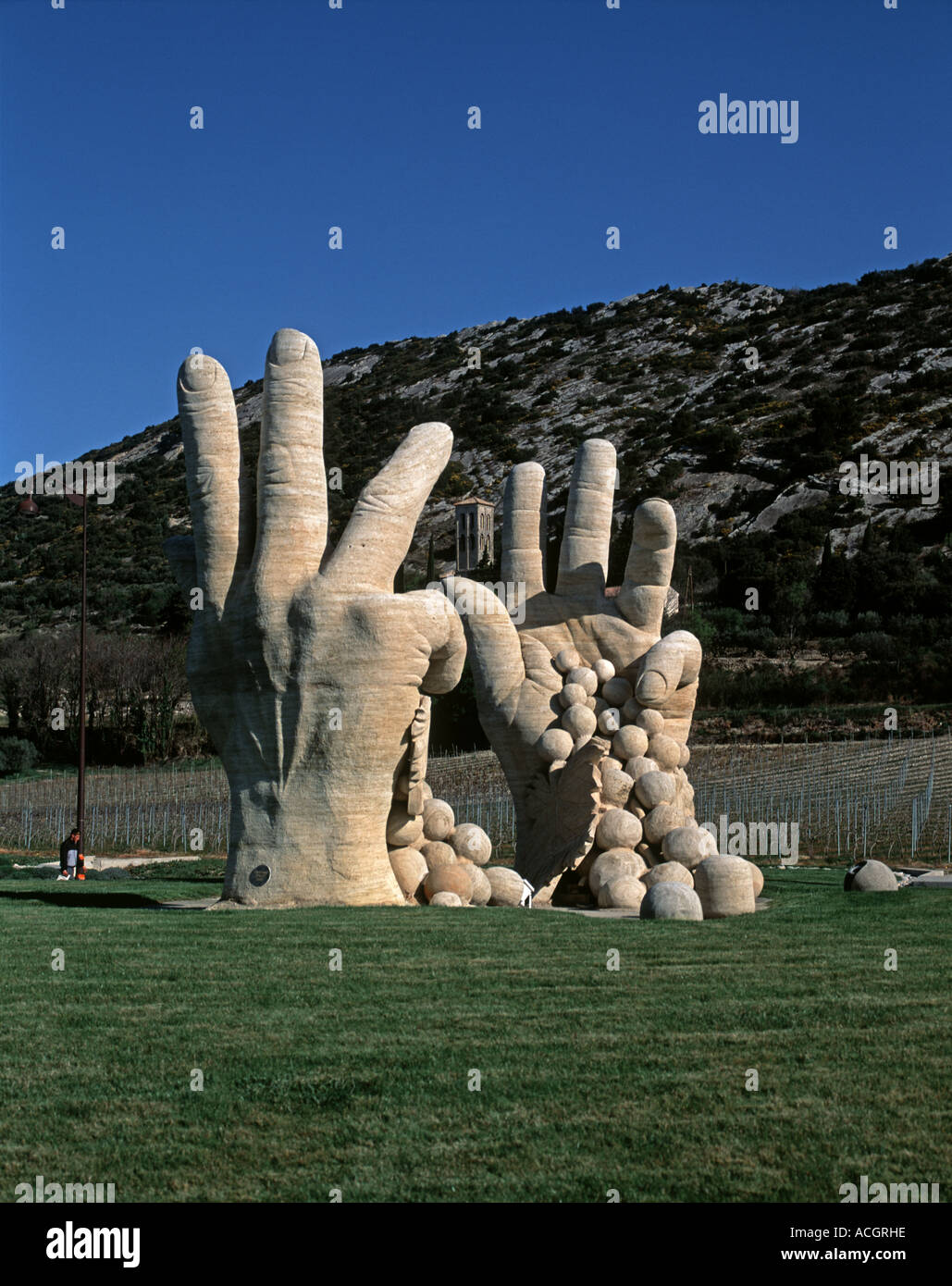 Giant hand sculpture with grapes at Beaumes de Venise Stock Photo - Alamy