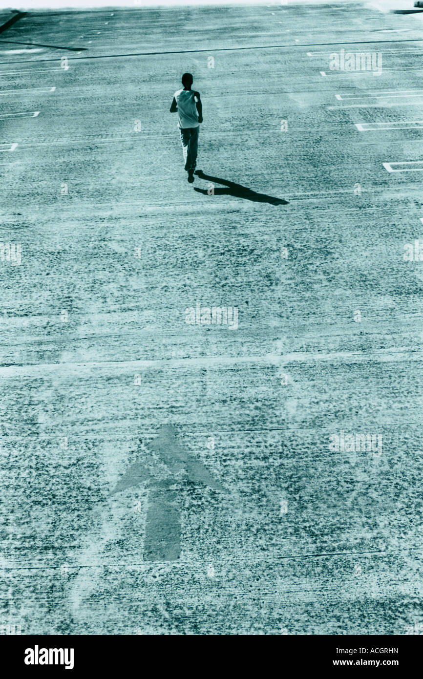 Man running view from the back black and white Stock Photo - Alamy