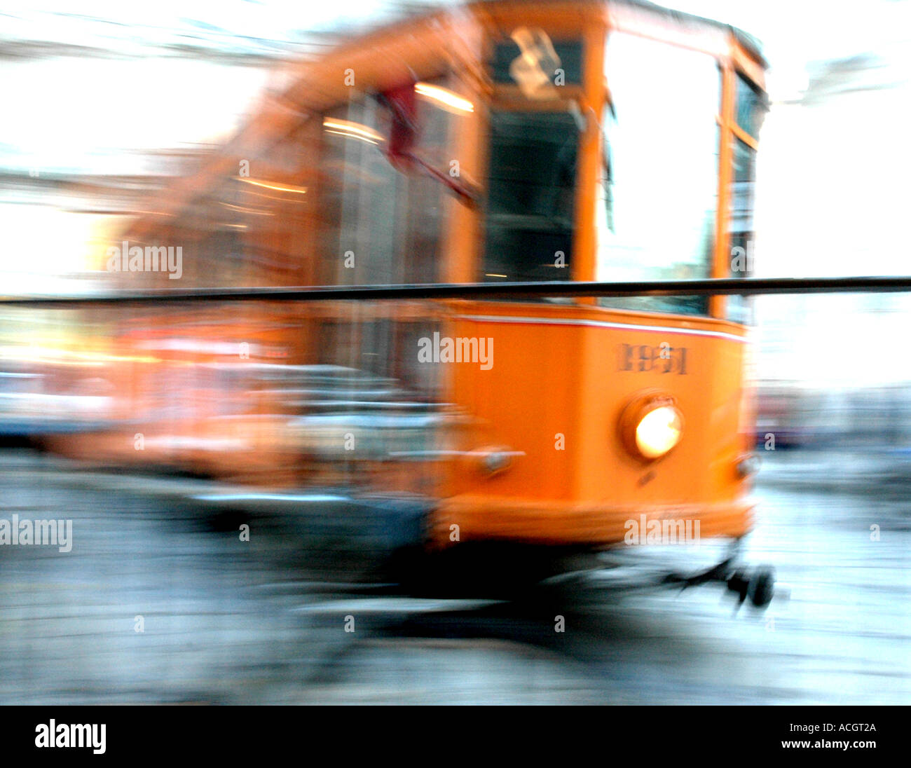Speeding Tram in streets of Milano Stock Photo - Alamy