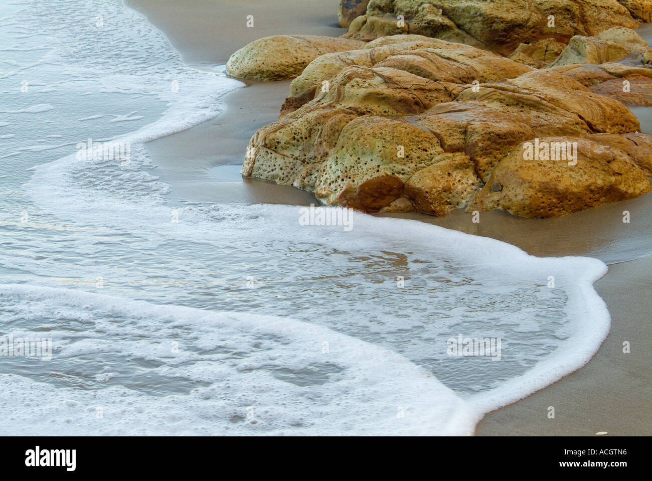 Ocean meets shore Stock Photo - Alamy