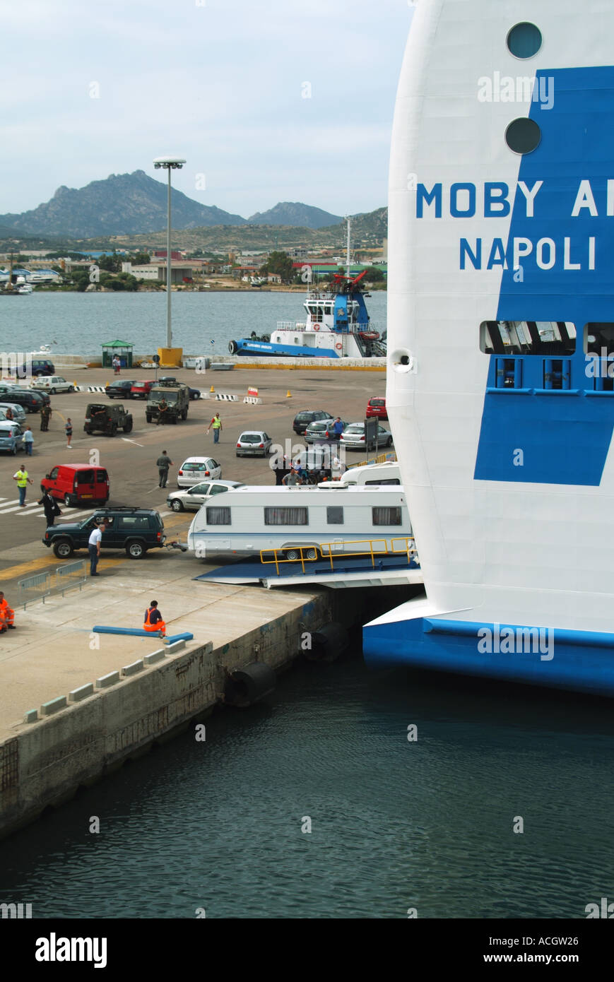 Olbia Sardina port vehicles disembarking from stern end of docked roll ...