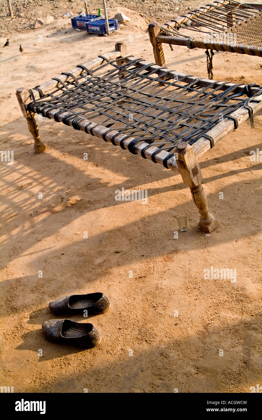 HAND MADE COTS TO SIT ON AND A PAIR OF SHOES Stock Photo - Alamy