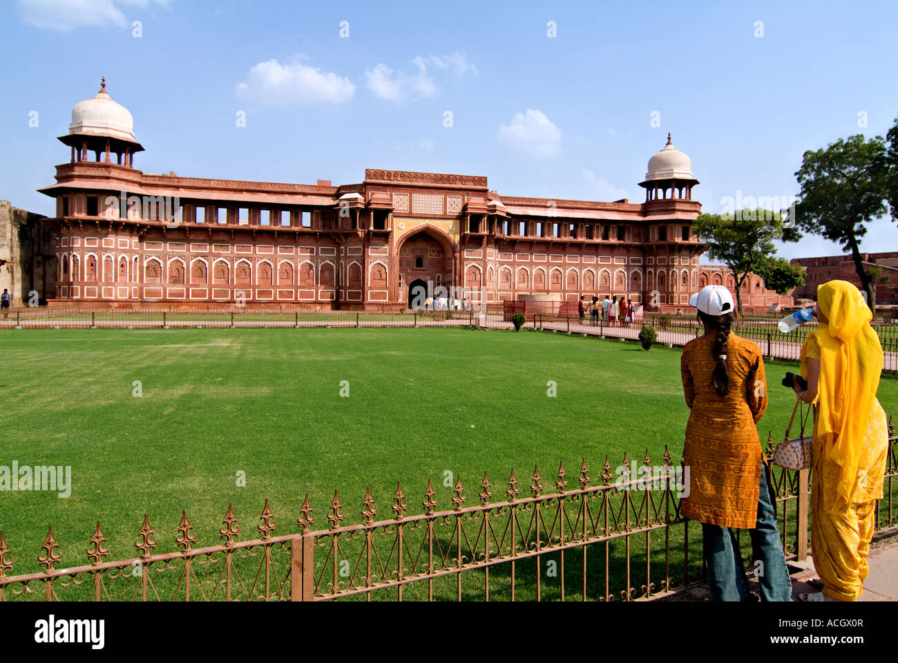 TWO GIRLS LOOKING AT Jahangiri Mahal - built by Akbar for his son ...