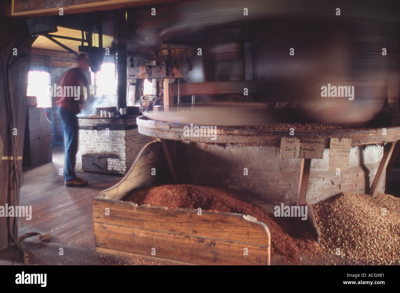 Inside of a Dutch oil mill Stock Photo - Alamy