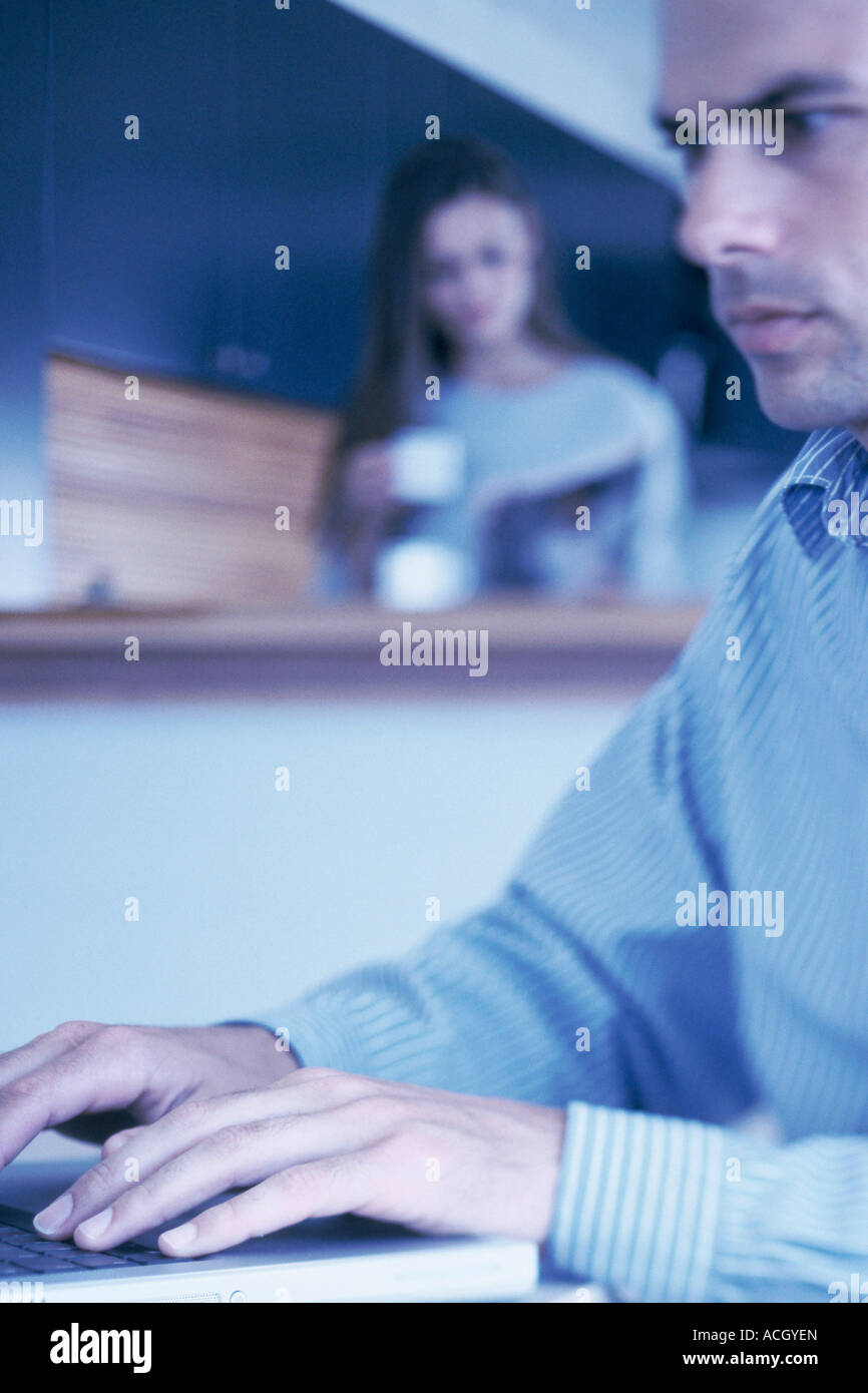 Portrait man profile working on computer woman reading Stock Photo - Alamy