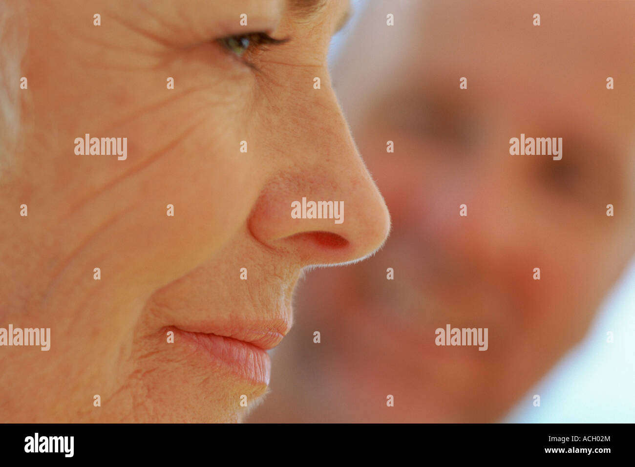 Portrait thoughtful woman man smiling behind blurred effect Stock Photo ...