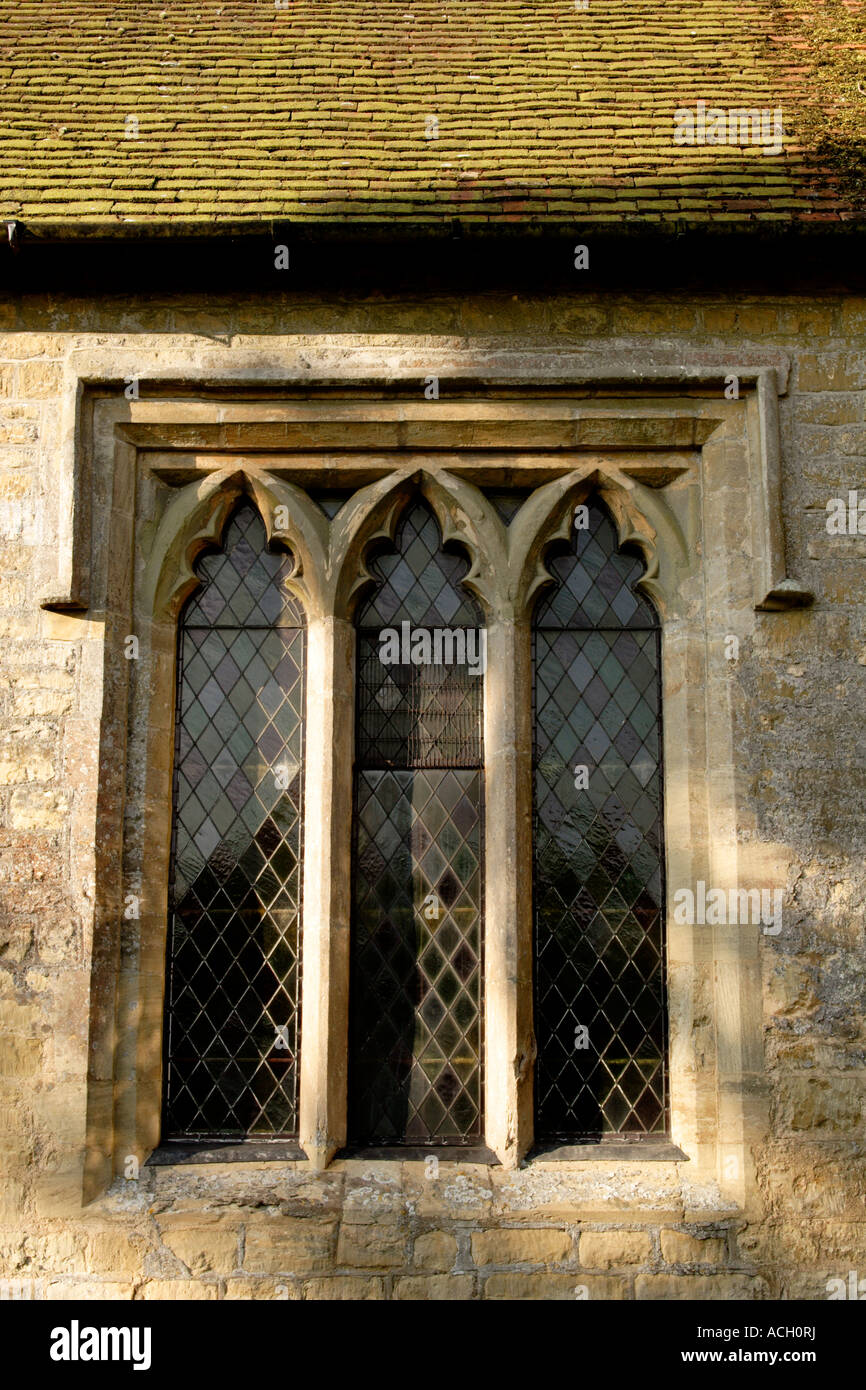 Church window close up in patchy sunlight Stock Photo - Alamy