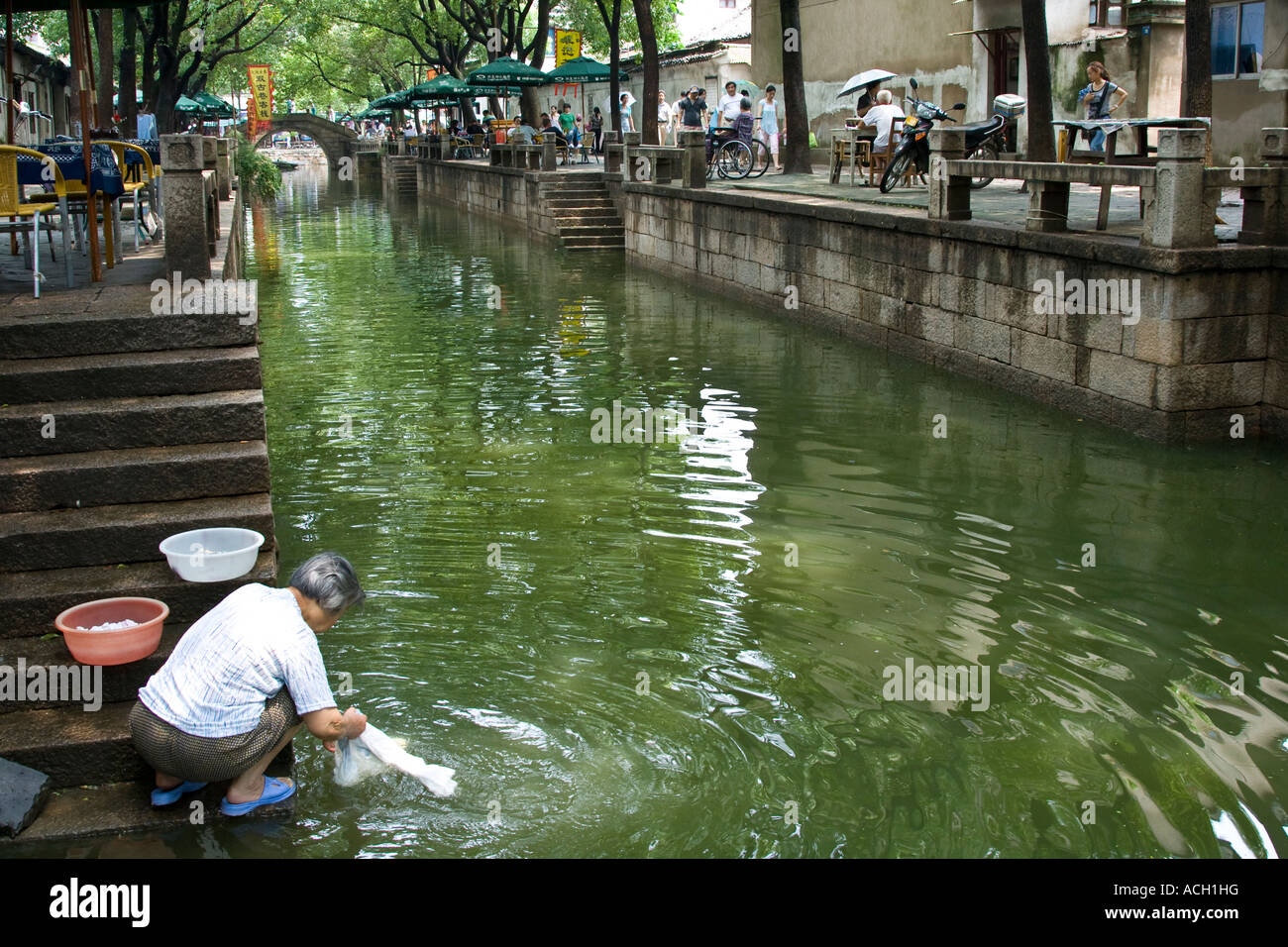 Woman Washing Laundry in Canal Tongli Water Town China Stock Photo - Alamy