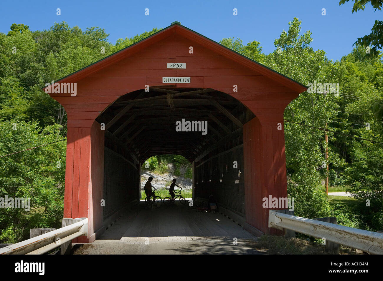 Kids bicycling over Bridge at the Green Battenkill River West Arlington ...