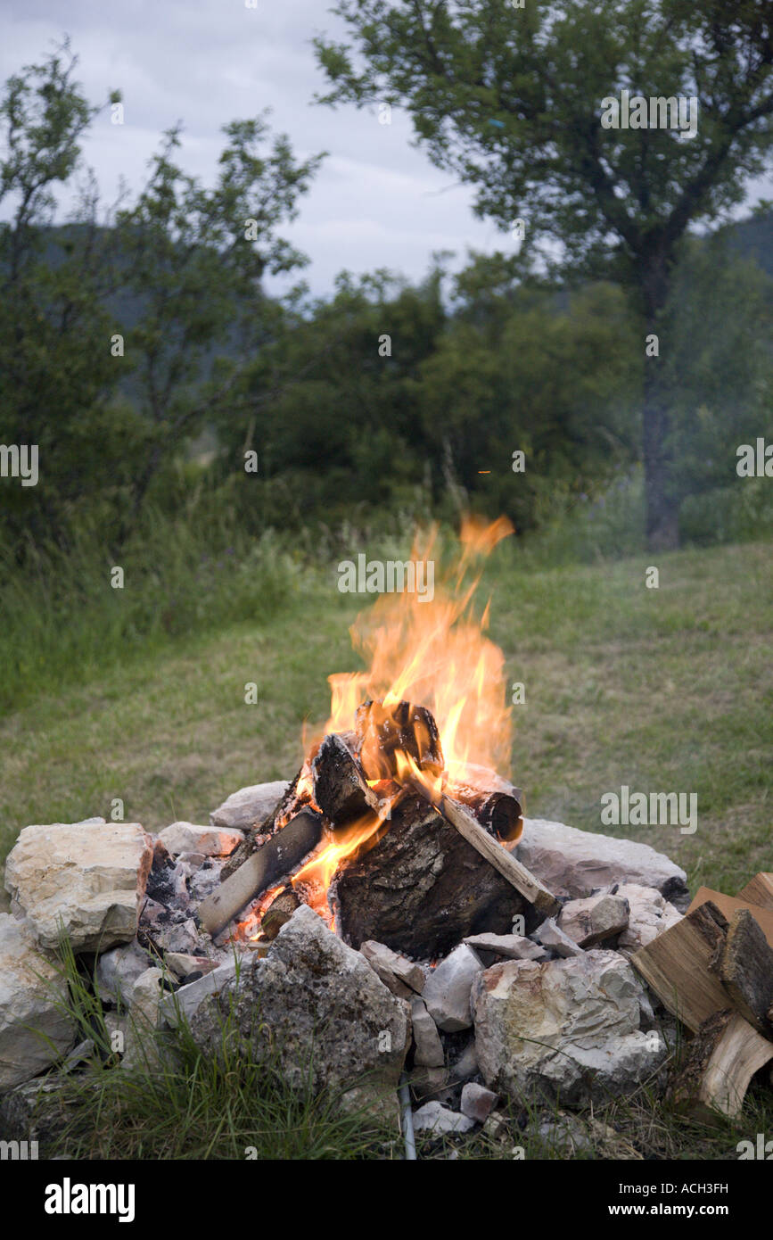 Burning campfire in a ring of stones, Drôme Provencale, France Stock ...
