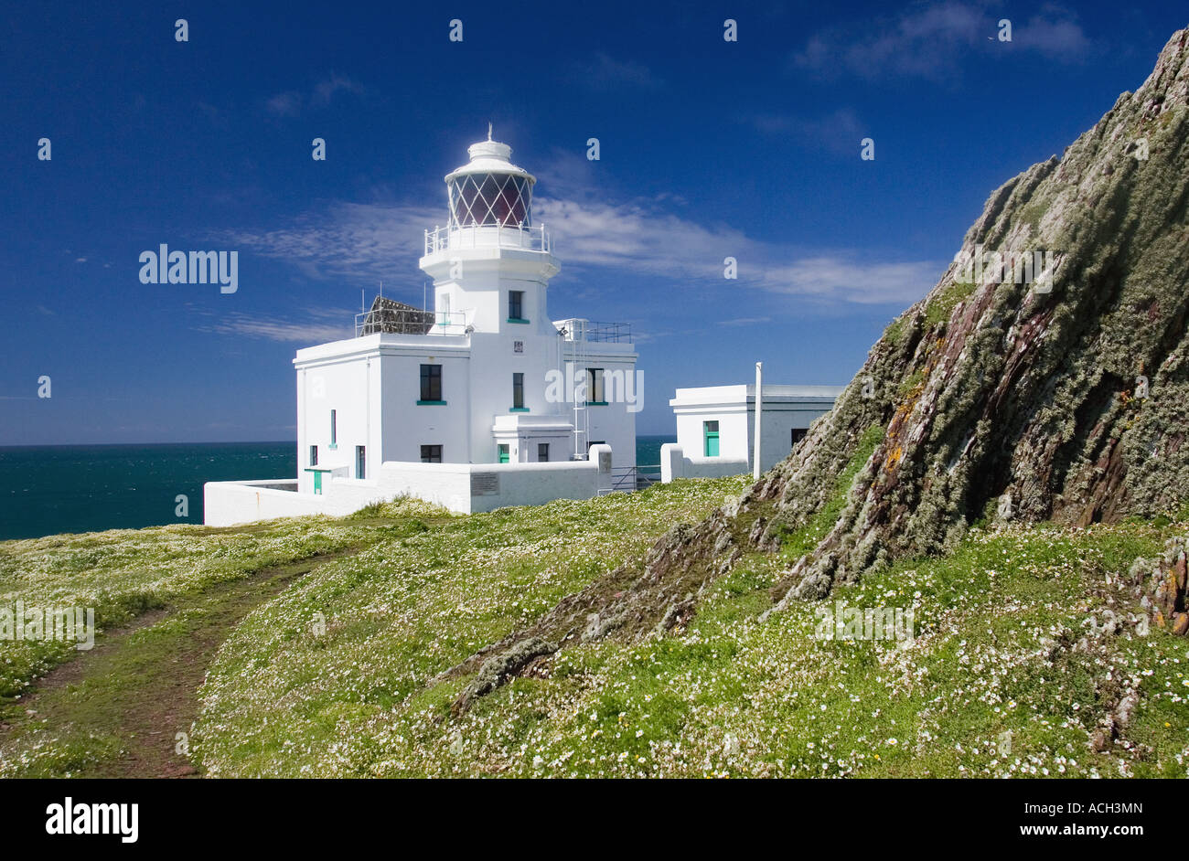 Trinity lighthouse, Skokholm Is, Pembrokeshire coast, Wales Stock Photo ...