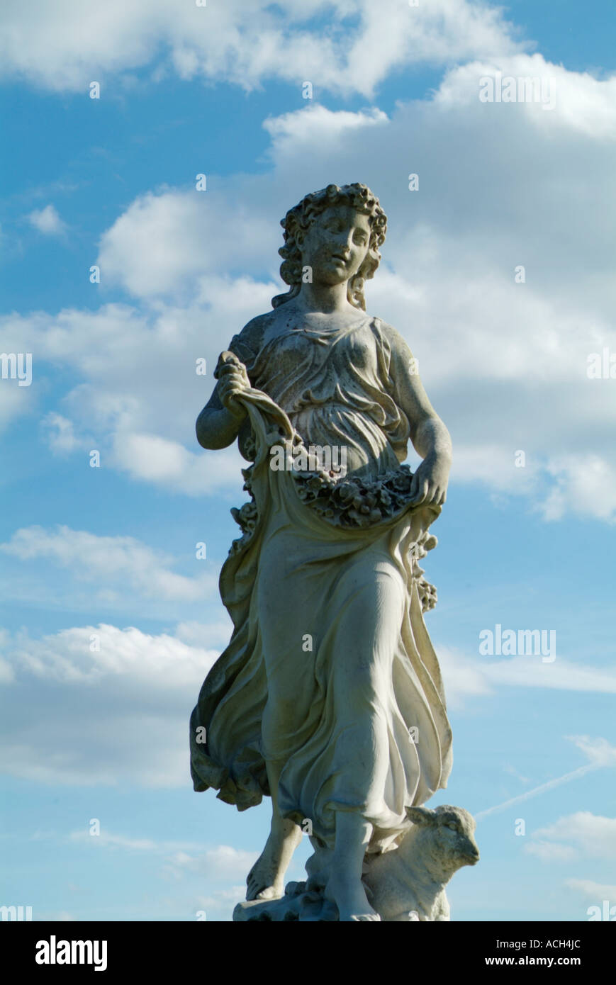 Female statue with lamb Stock Photo - Alamy