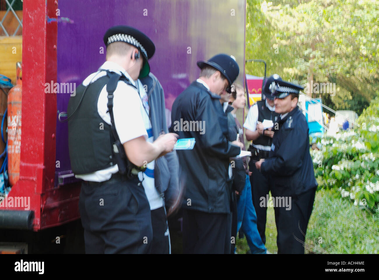 Police checking for drugs at Kingston Green Fair, Surrey, England, UK ...