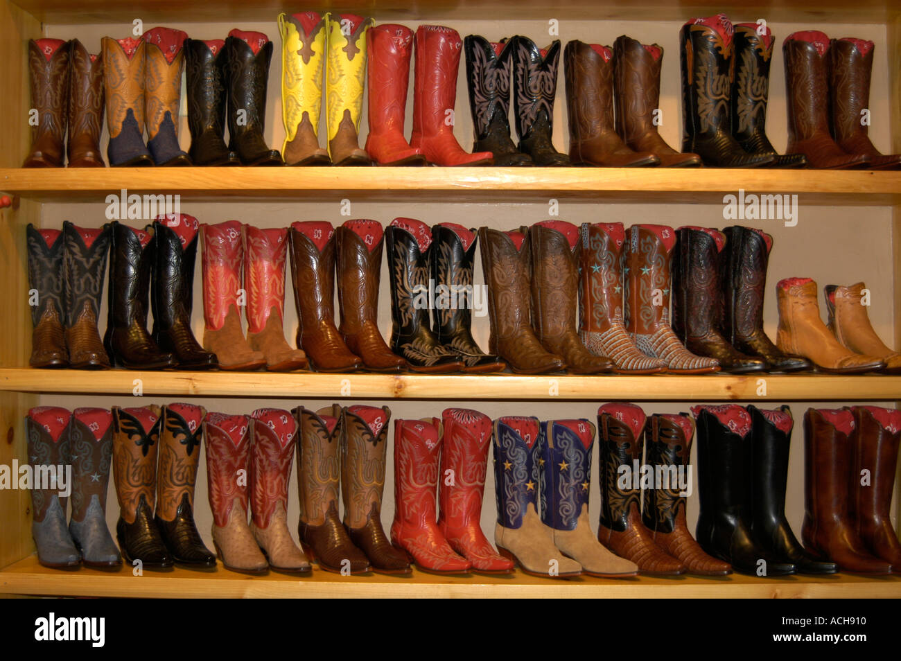 Display of ornate cowboy boots in a shop in Aspen Colorado USA North ...