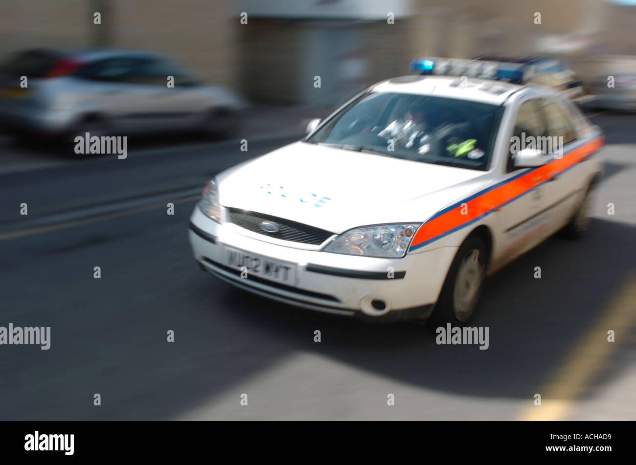 Police Car at speed Stock Photo - Alamy