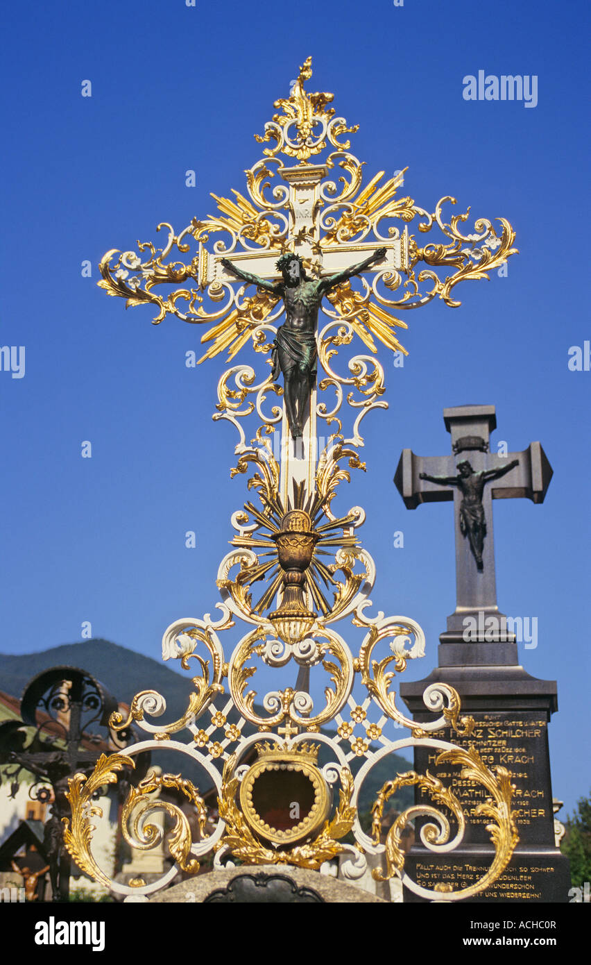 A very decorated in baroque style christian cross made of golden ...