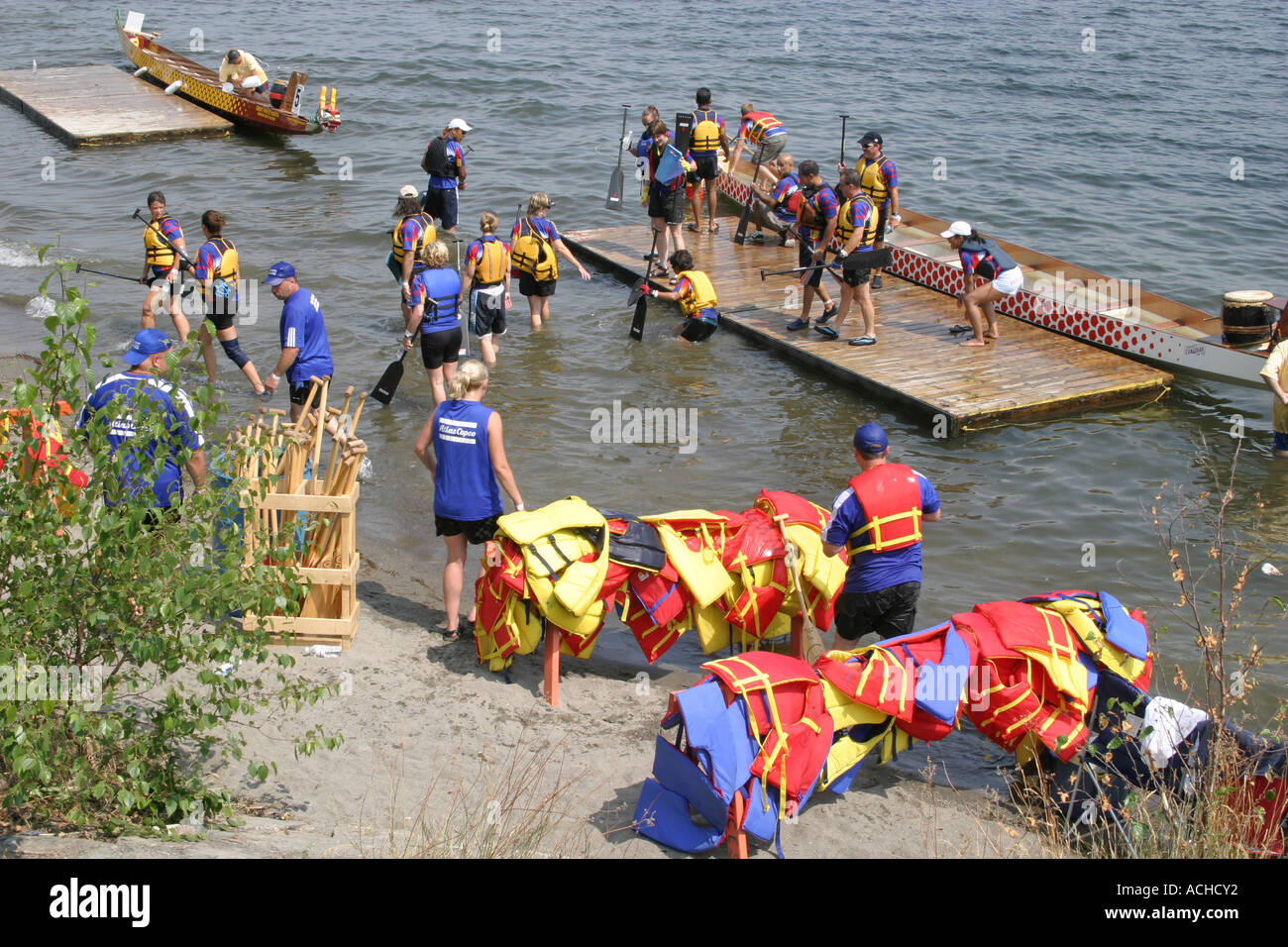 boating team preparing for boarding Stock Photo - Alamy