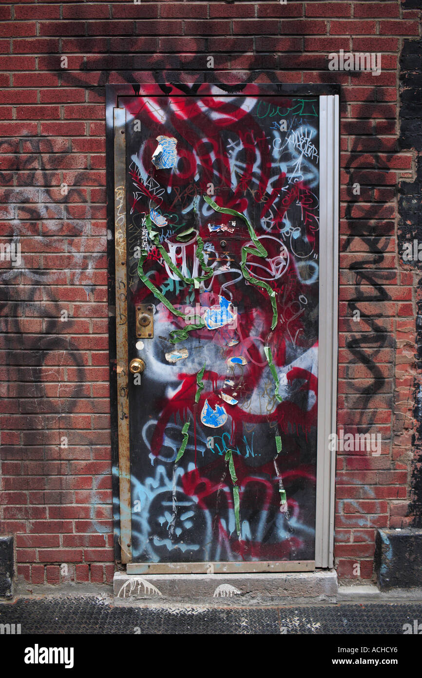 Entry door covered in graffiti hi-res stock photography and images - Alamy