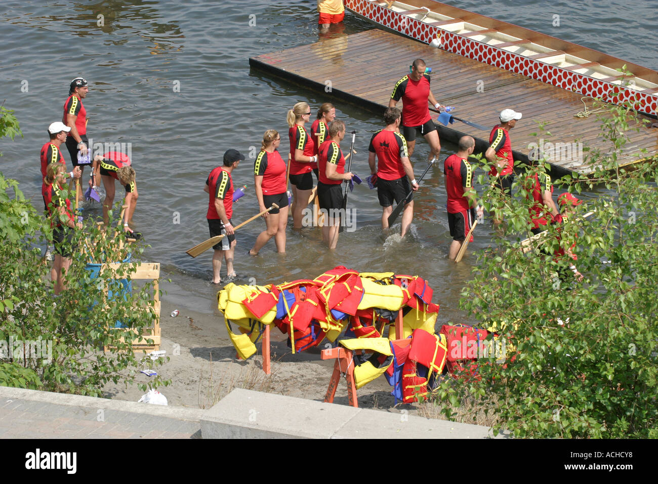 boating team preparing for boarding Stock Photo - Alamy