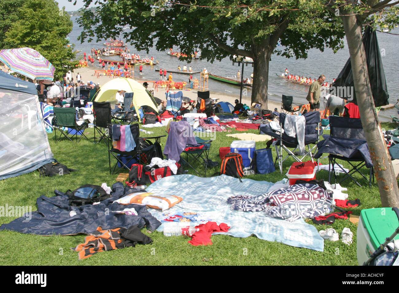 crowded picnic area with blankets and towels Stock Photo - Alamy