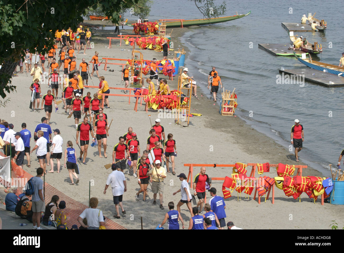 boat racing teams marching on beach Stock Photo - Alamy