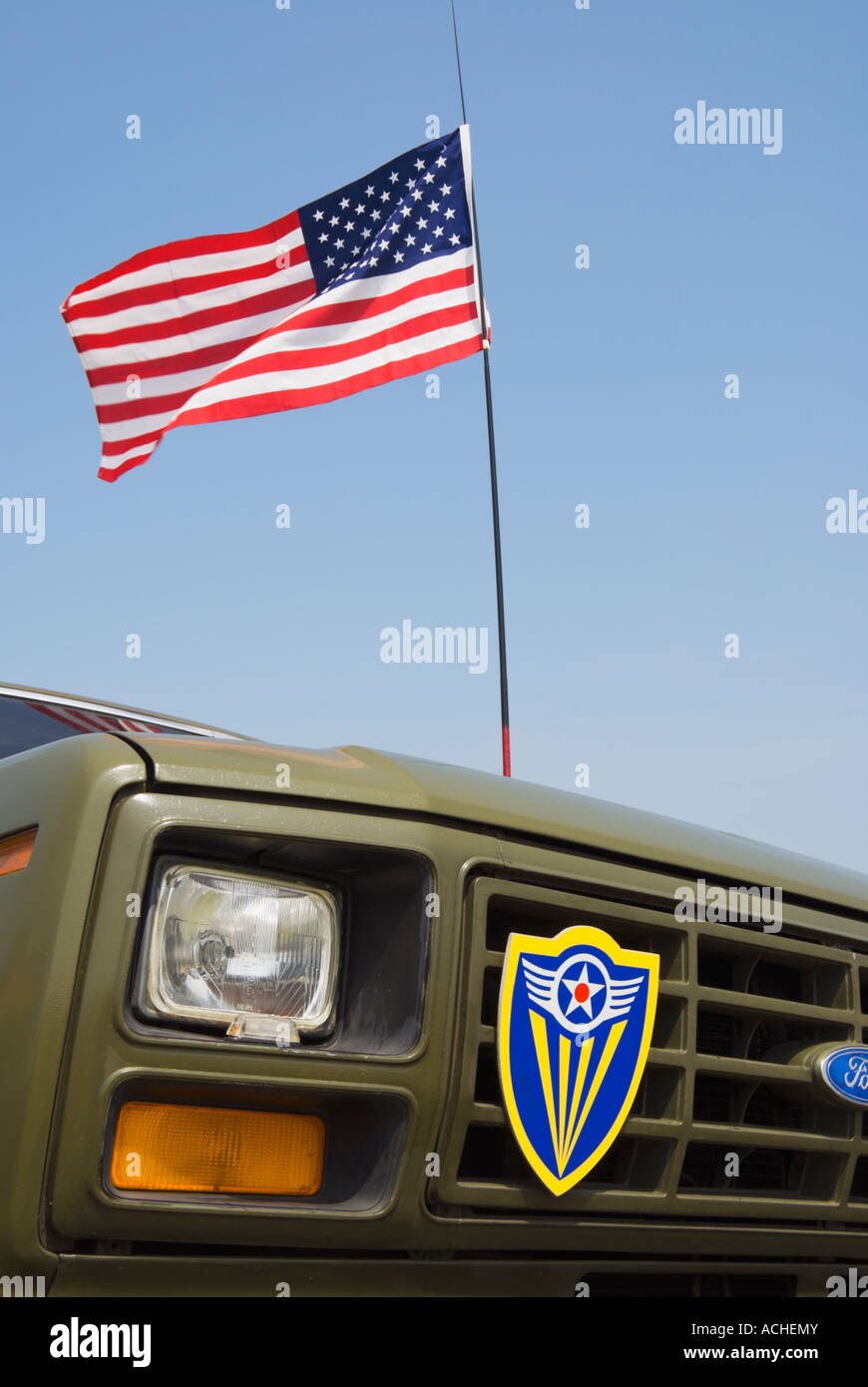 An American Ford Pick up in Military Colors and an American flag Stock ...