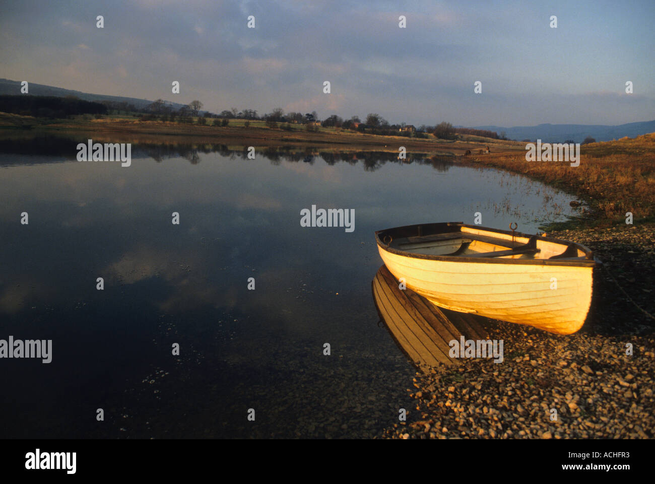 Landscape with lake and rowing boat hi-res stock photography and images ...