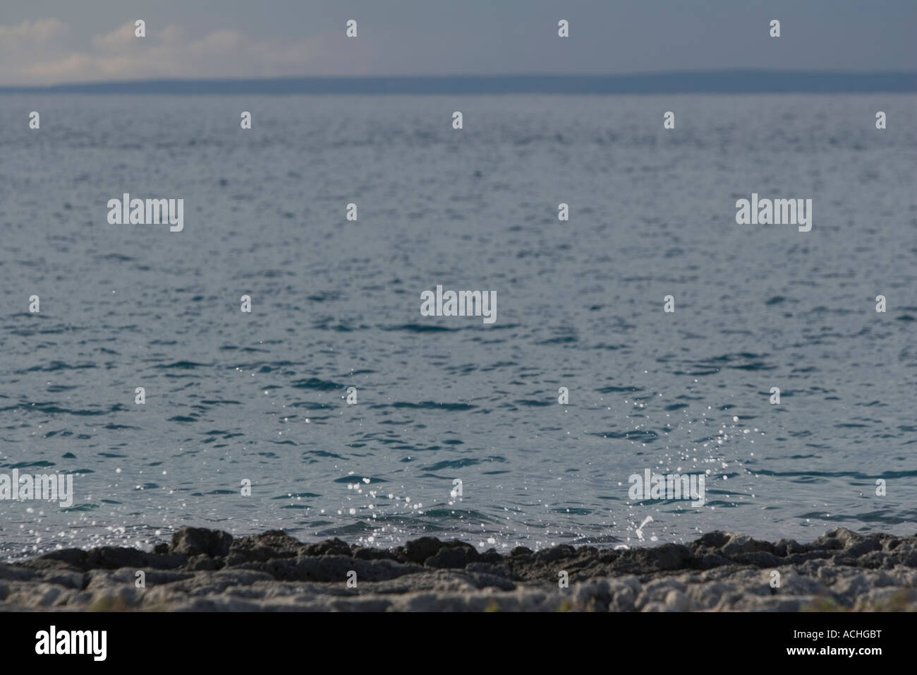 Rocky shore and stormy sky, Puglia, Italy Stock Photo - Alamy