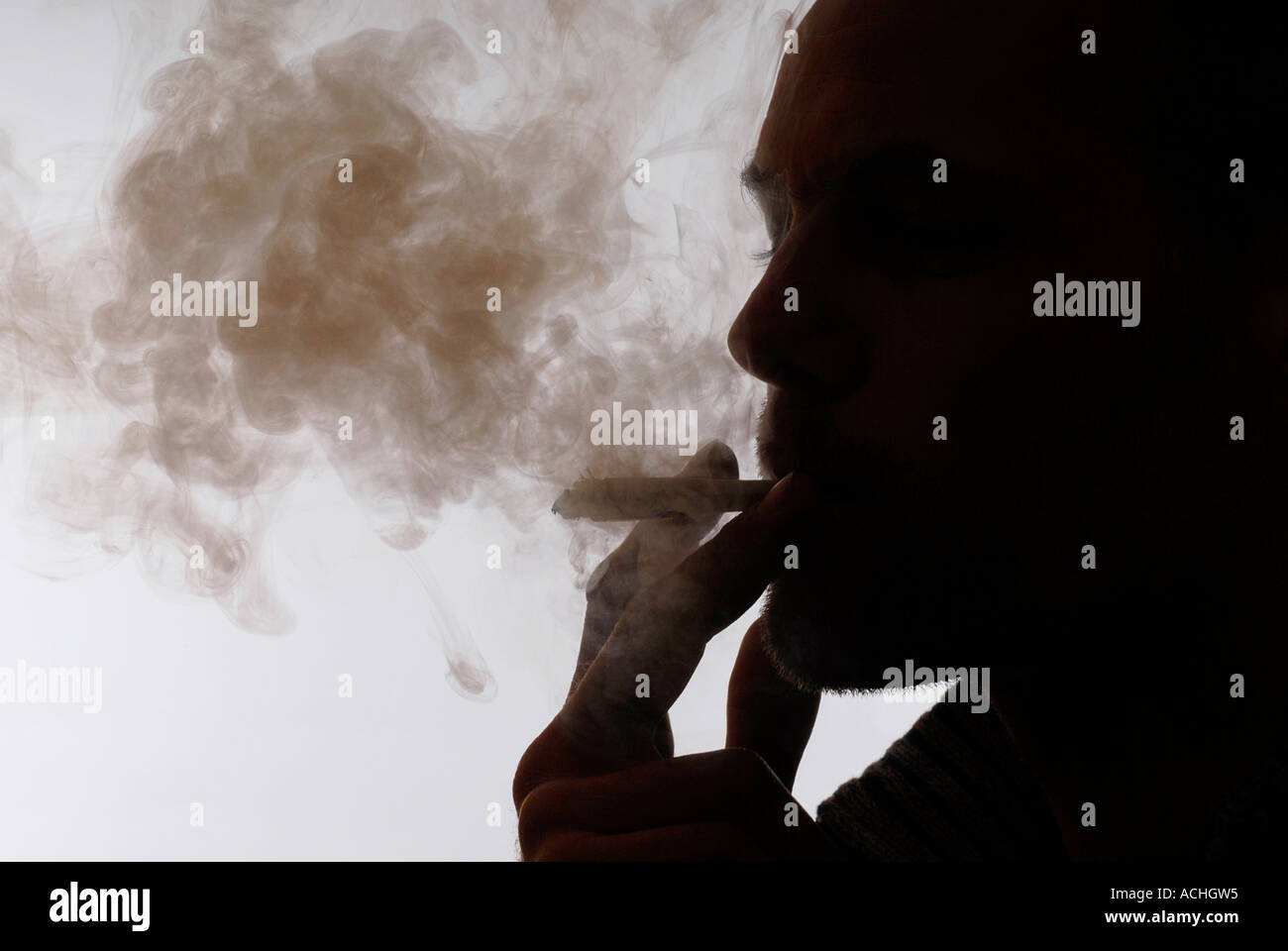 CANNABIS JOINT BEING SMOKED REEFER SPLIFF MARIJUANA CIGARETTE Stock ...