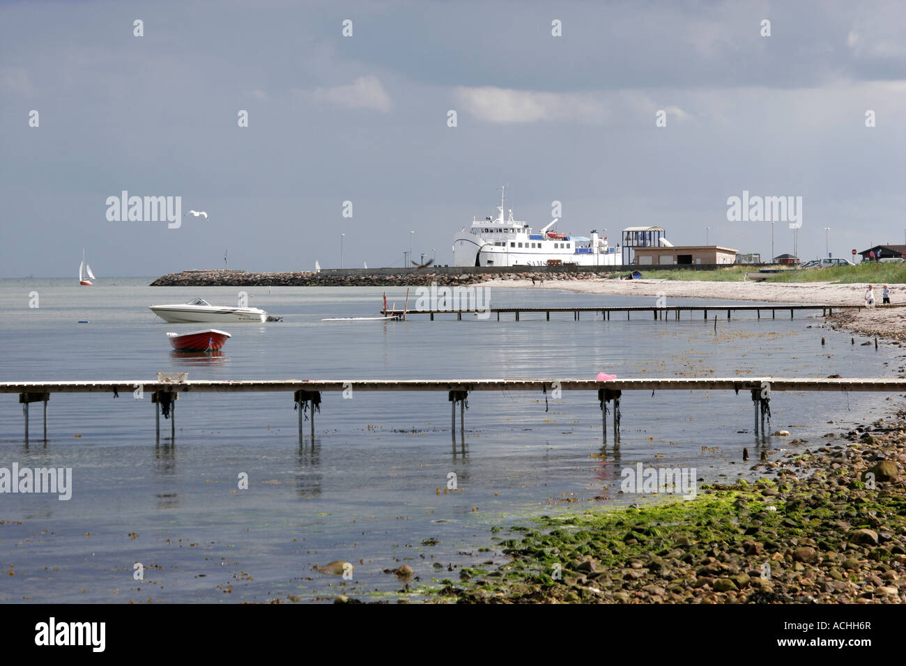 Harbor and beach with boardwalks Stock Photo - Alamy