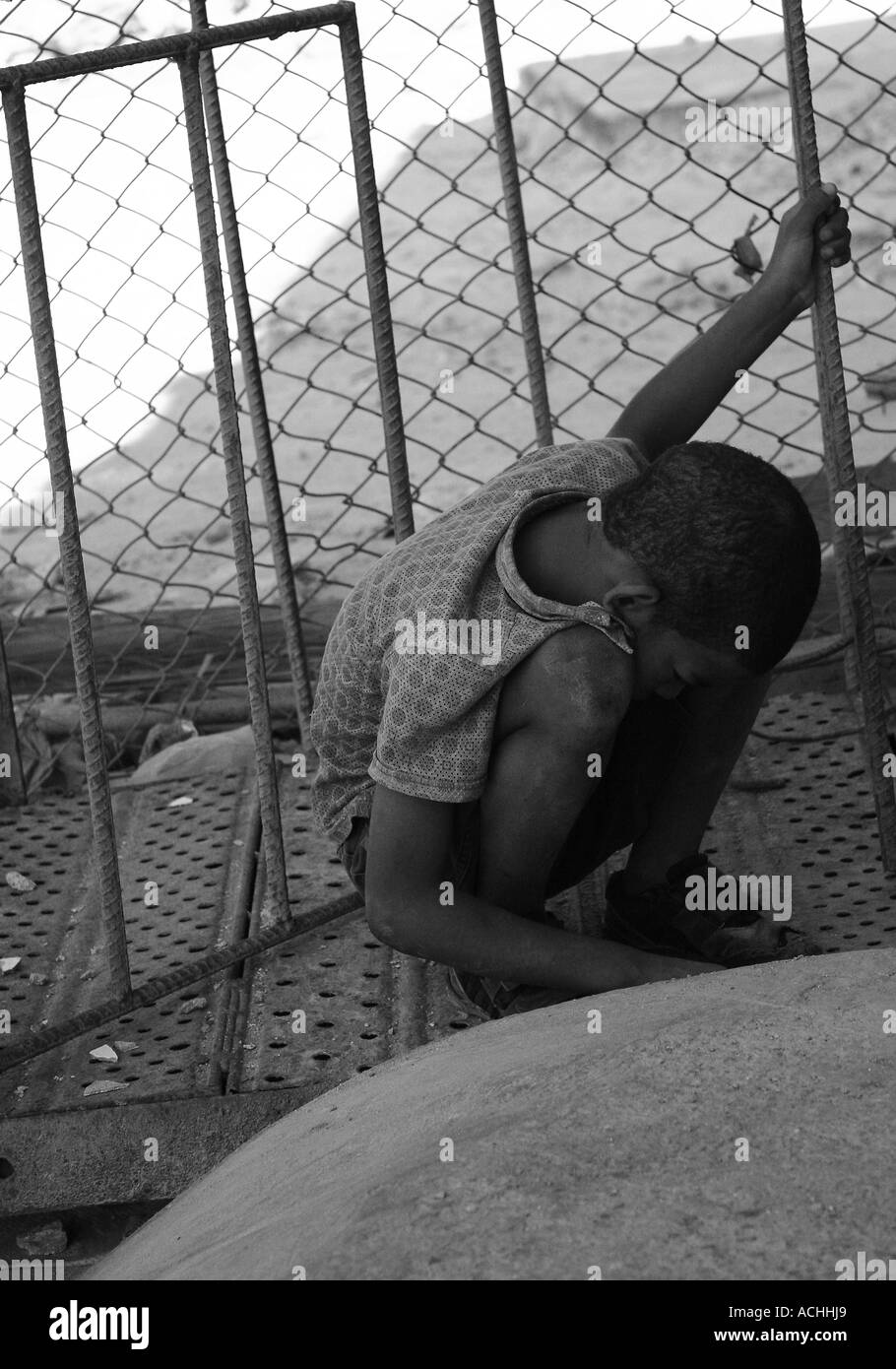 A young Cuban boy plays in isolation Stock Photo - Alamy