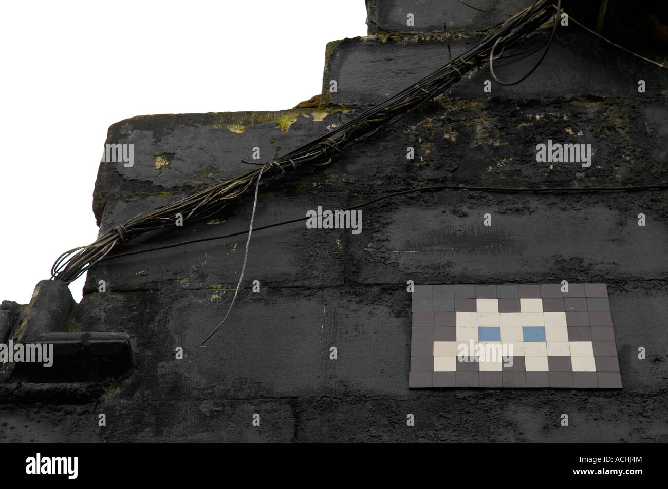 space invaders urban invasion tile campaign manchester england uk wall ...