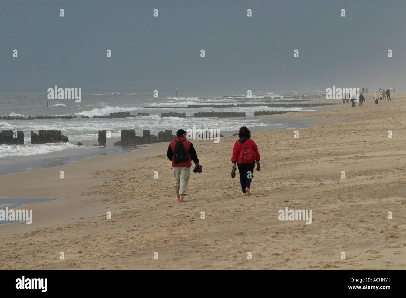 People walking at the beach at bad weather, Sylt, Schleswig Holstein ...